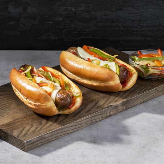 Grilled Italian Sausage On A Bun With Cheese And Peppers Dempsters